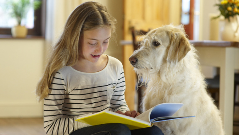 Reading to Dogs Could Help Children Learn - DogTime